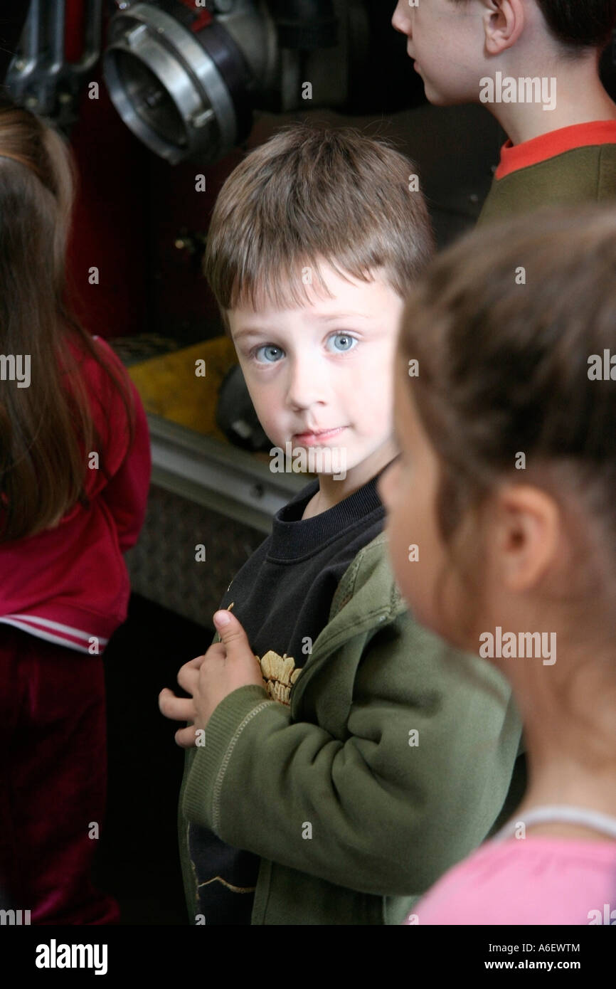 School boy on firehouse field trip Stock Photo - Alamy