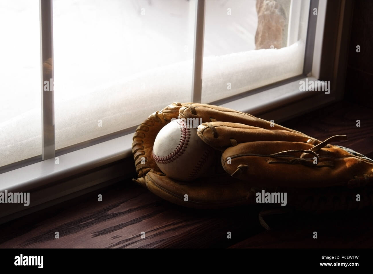 Baseball in winter: still life Stock Photo - Alamy