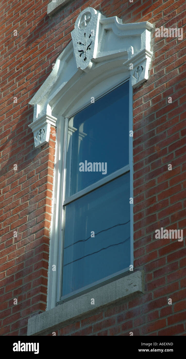 Attractive older window in a brick building with an attractive ornate ...