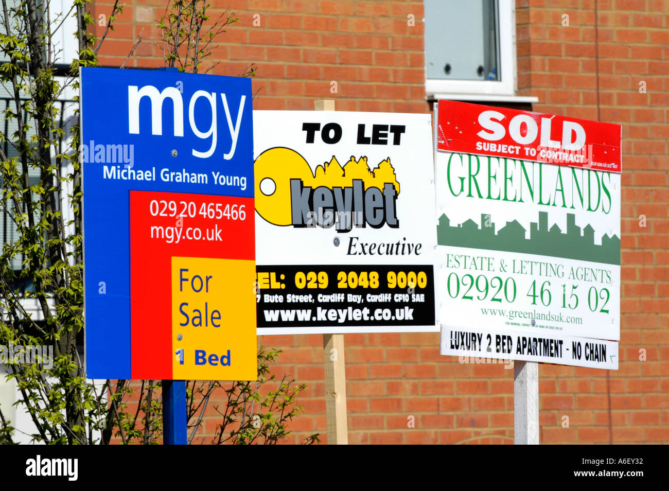 FOR SALE, SOLD, TO LET, LET BY, signs in Cardiff Bay, South Wales, UK ...