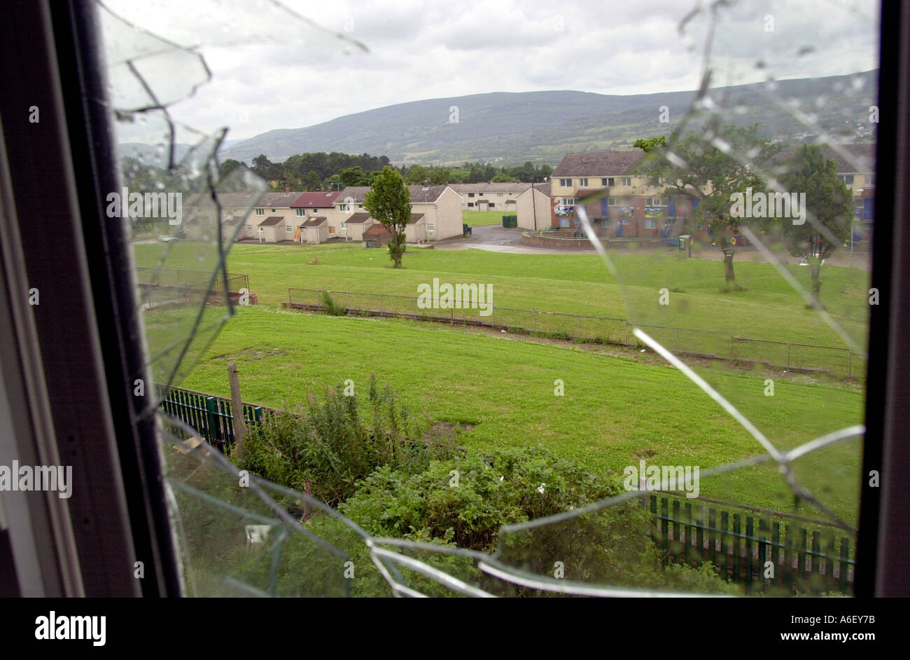 View thru smashed window of empty derelict house on the Gurnos Estate ...