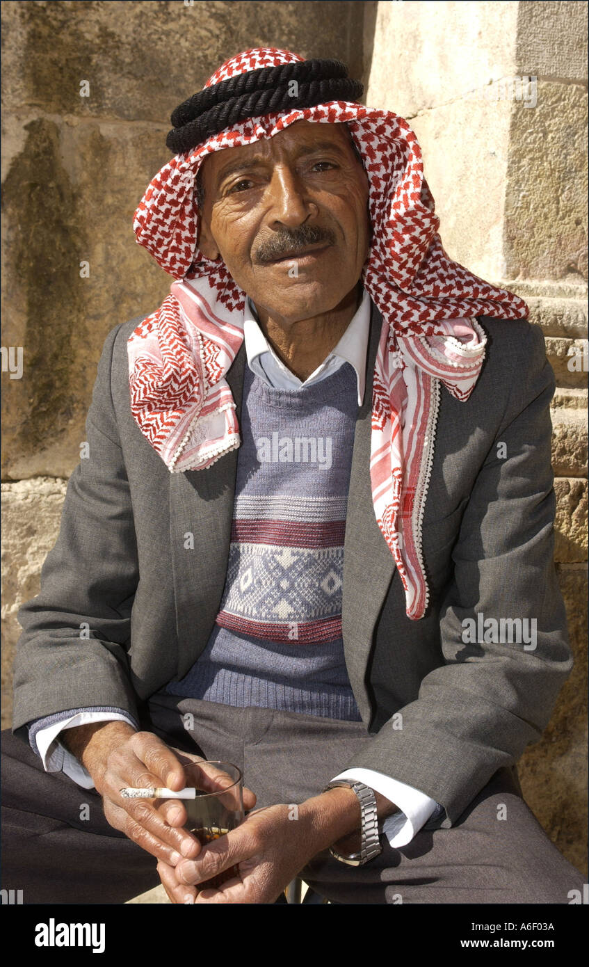 Arabic man sat in street Amman Jordan Stock Photo - Alamy