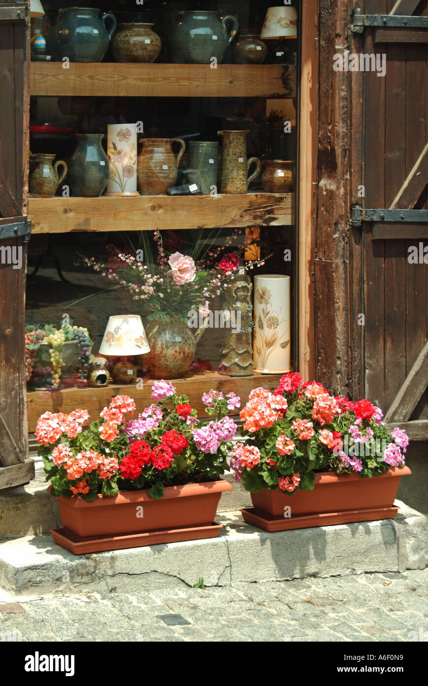 Carcassonne fortified medieval town shop window with display of flowers ...
