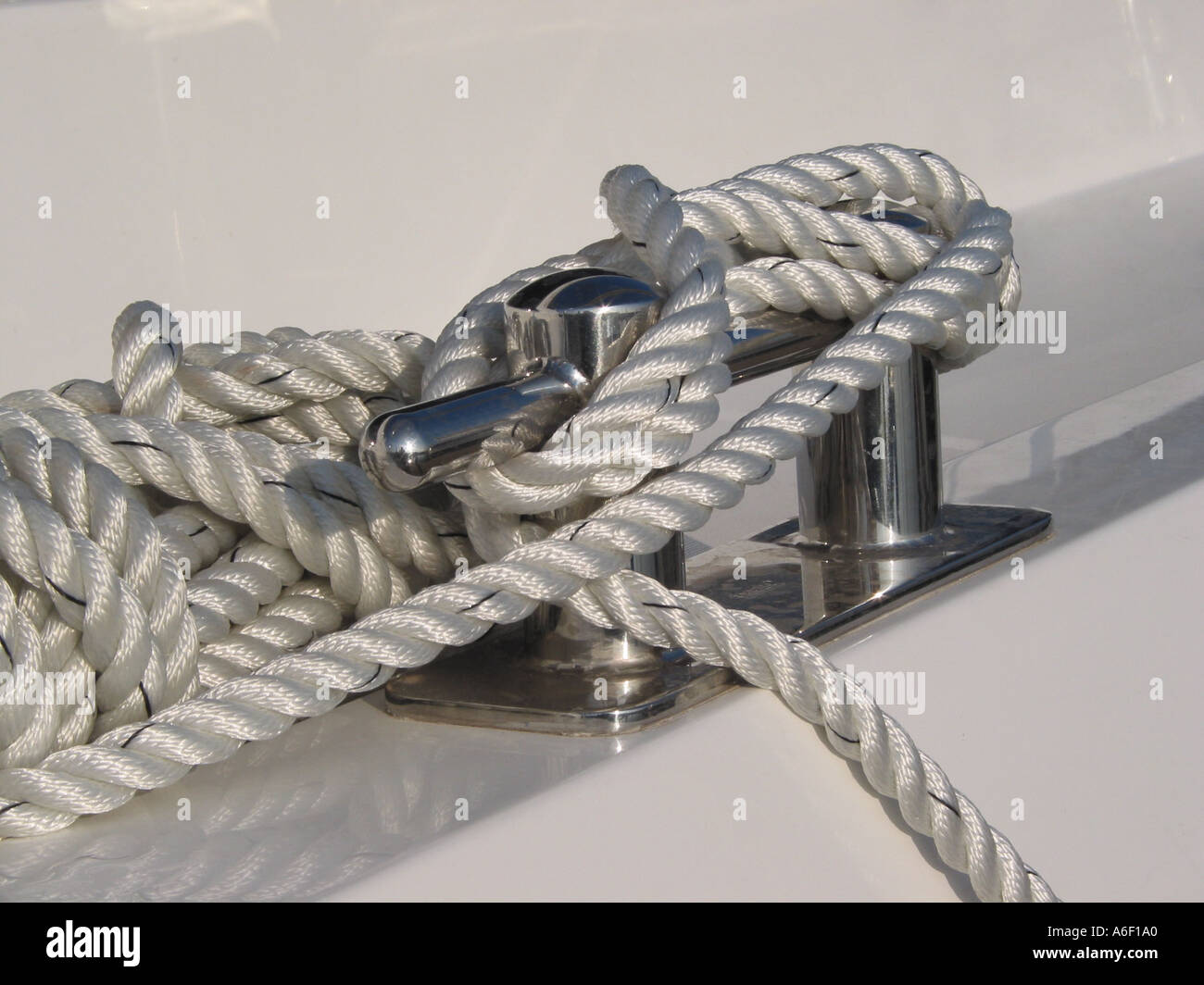 Luxury Yacht Stainless Deck Cleat with Mooring Rope Stock Photo - Alamy