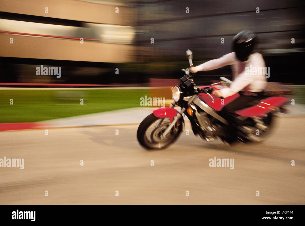 Businessman commuting on motorcycle hi-res stock photography and images ...