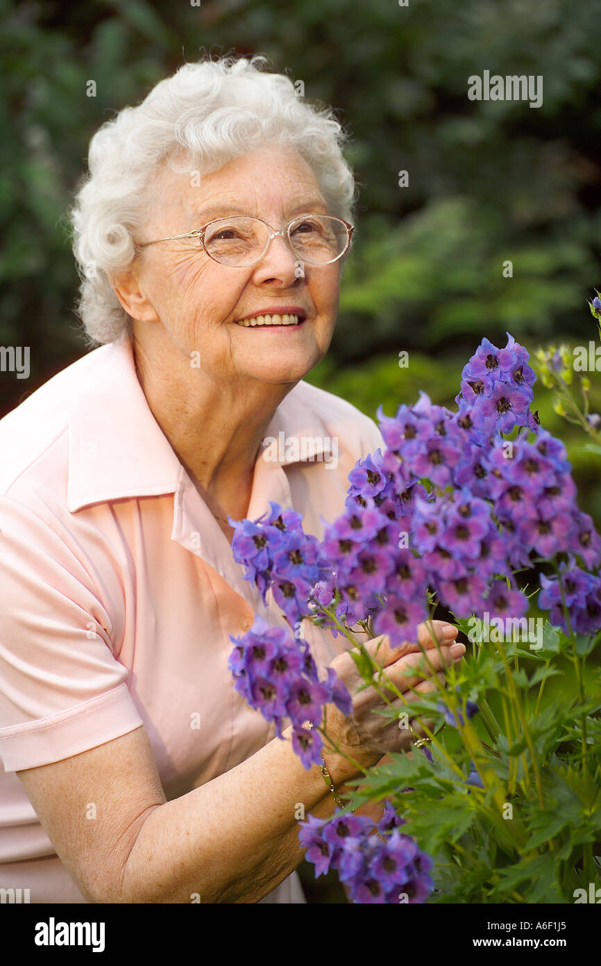 Old Lady in her garden Stock Photo - Alamy
