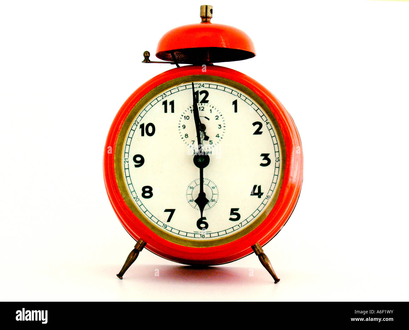 Old red alarm clock Stock Photo - Alamy