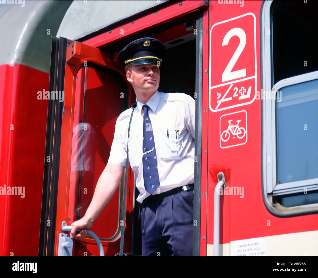 Railway Guard in doorway of Cogwheel train in Jizerske Hory Czech ...