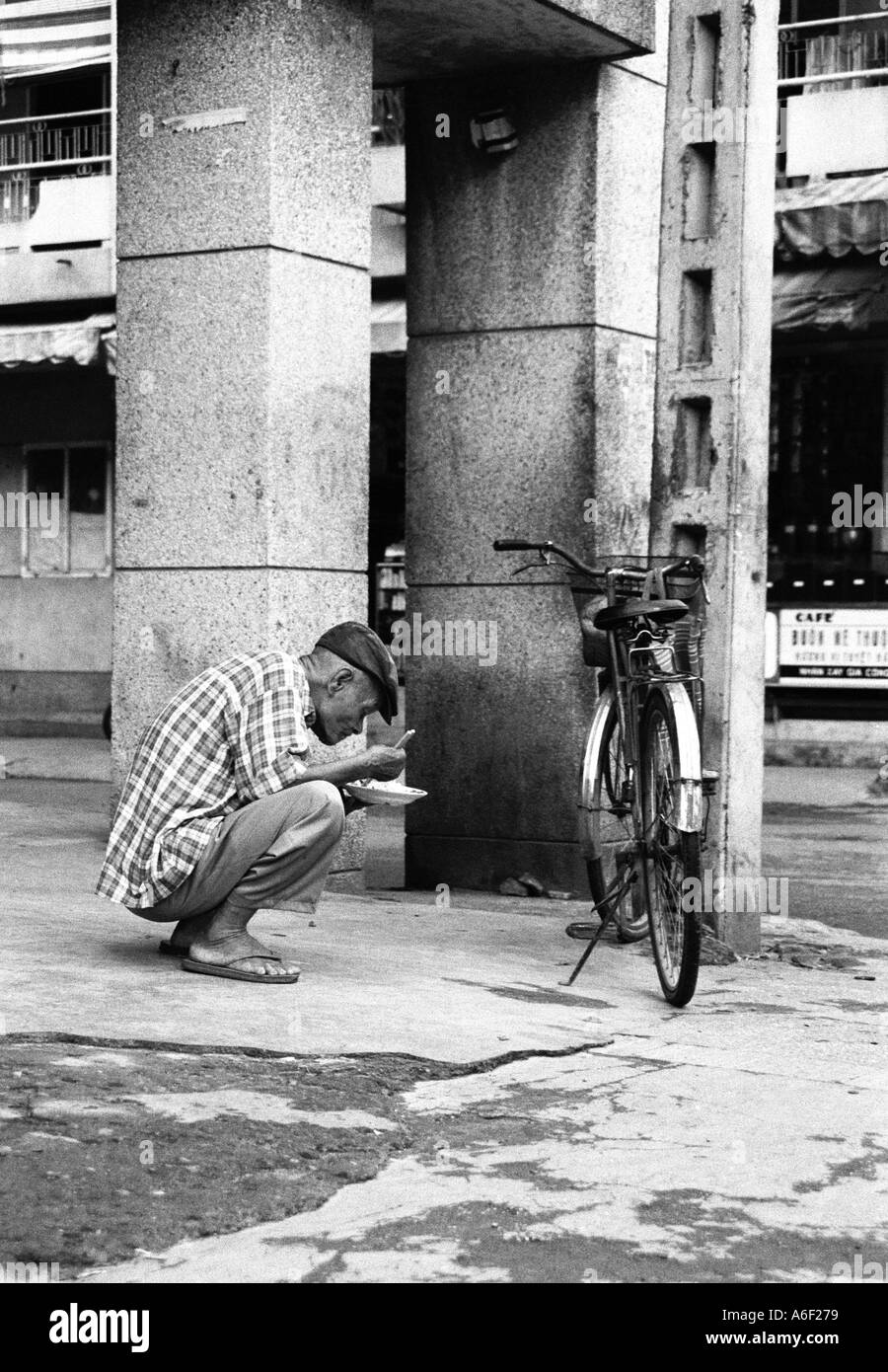 Man eating rice Black and White Stock Photos & Images - Alamy