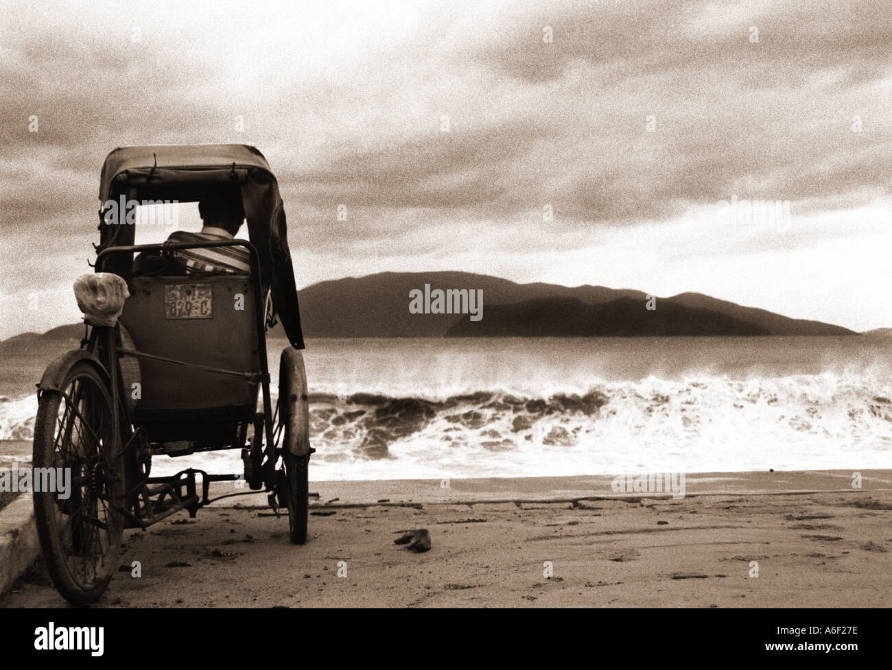 Cyclo driver taking a break Stock Photo - Alamy