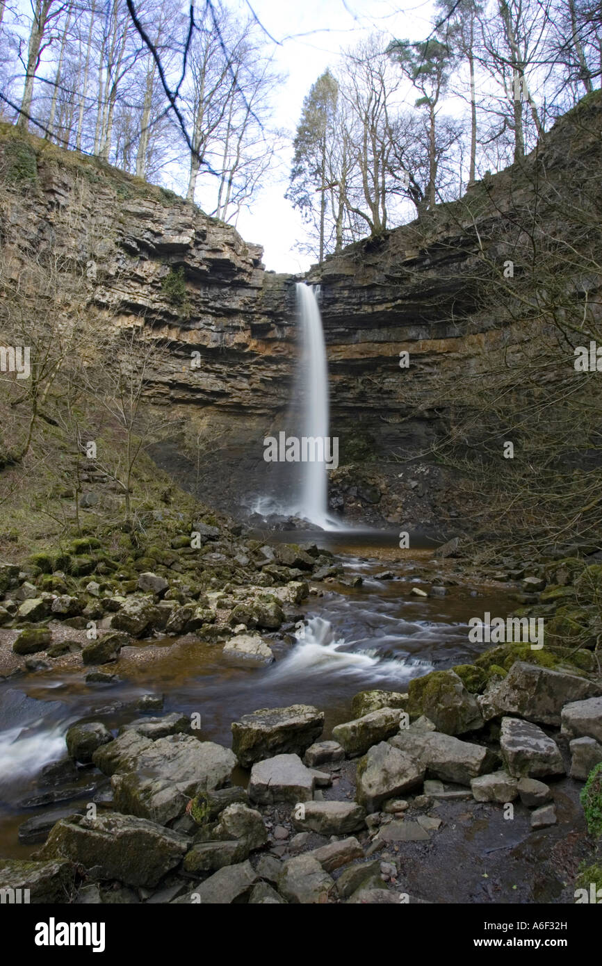 waterfall cascading onto rocks at Hardraw Force Hardraw Yorkshire Dales ...