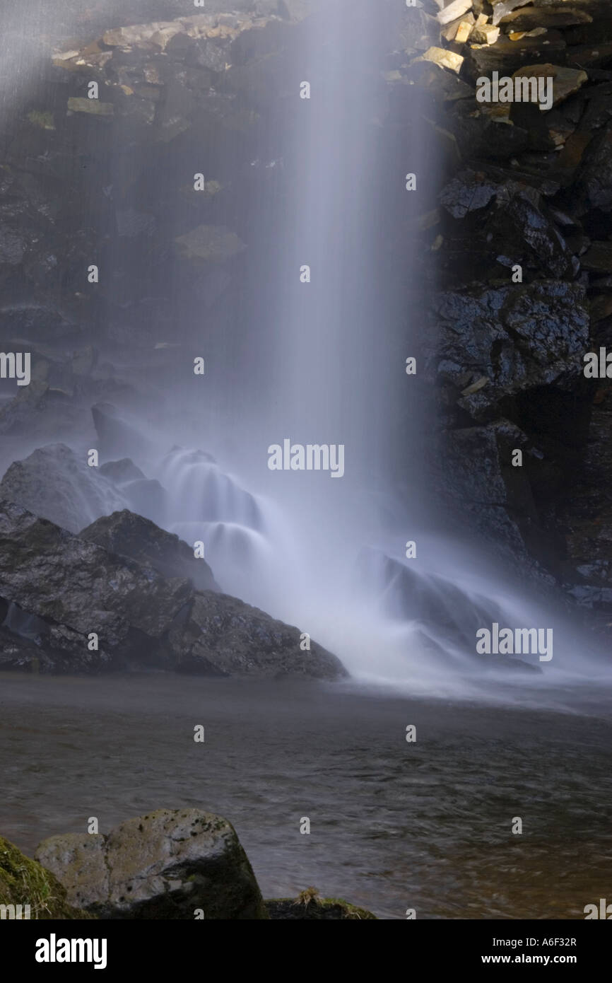 waterfall cascading onto rocks at Hardraw Force Hardraw Yorkshire Dales ...