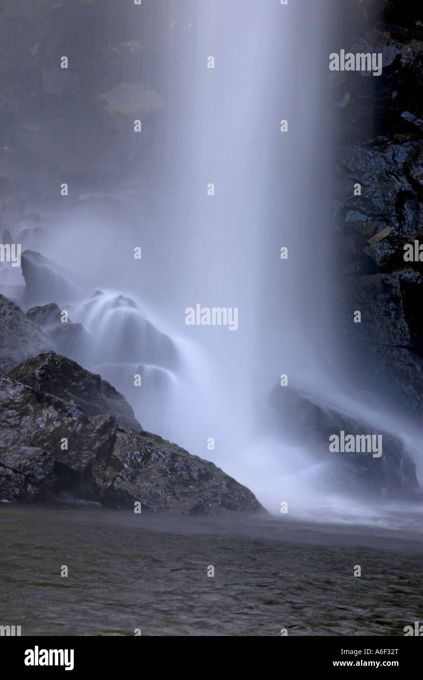 waterfall cascading onto rocks at Hardraw Force Hardraw Yorkshire Dales ...