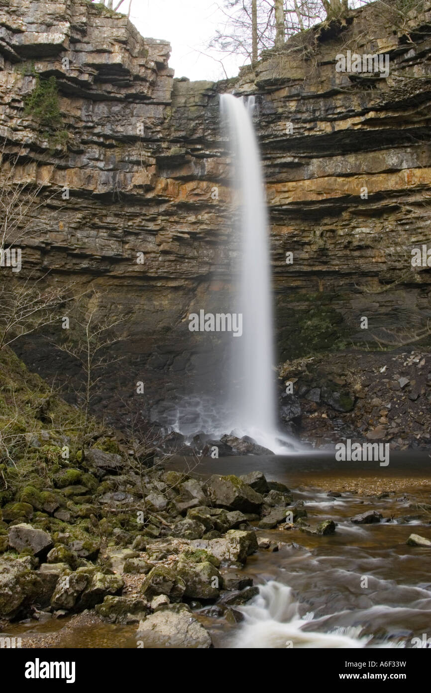 waterfall cascading onto rocks at Hardraw Force Hardraw Yorkshire Dales ...
