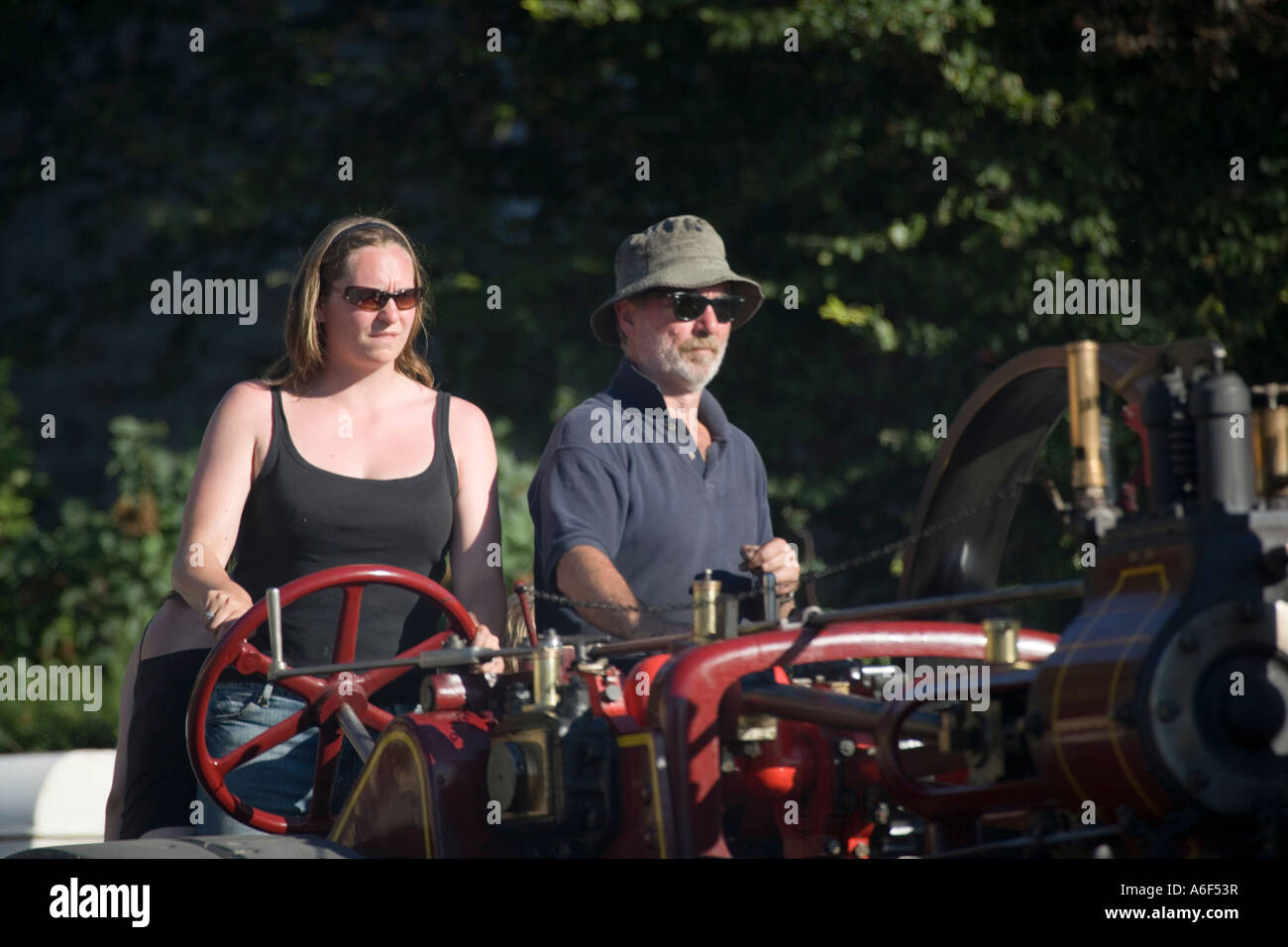 Man and woman driving a steam engine at the annual Masham Steam Engine ...
