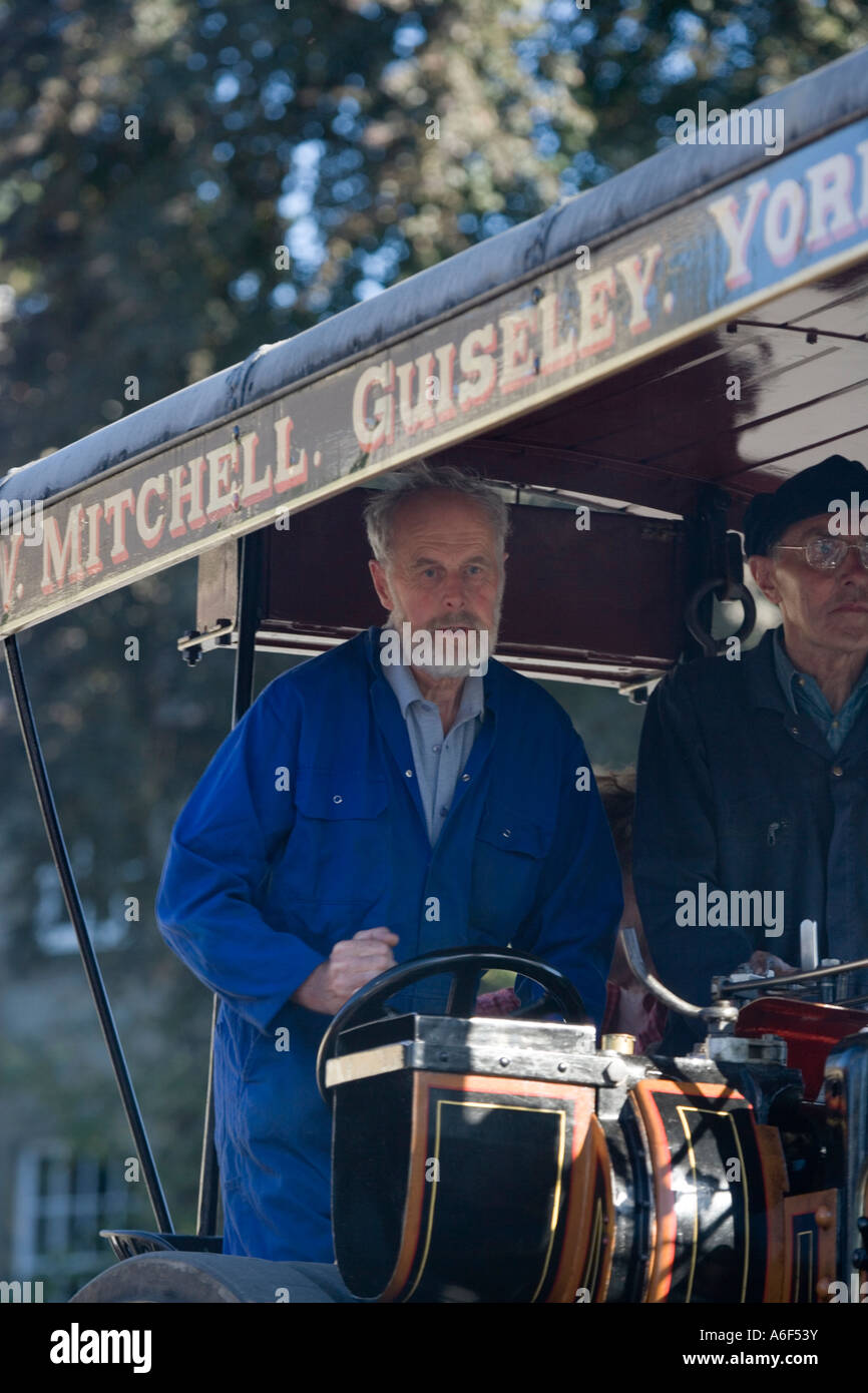 Two men driving a steam engine at the annual road run at the Masham ...