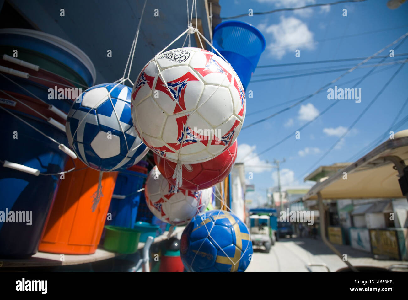BELIZE San Pedro Ambergris Caye Soccer balls for sale hung outside ...