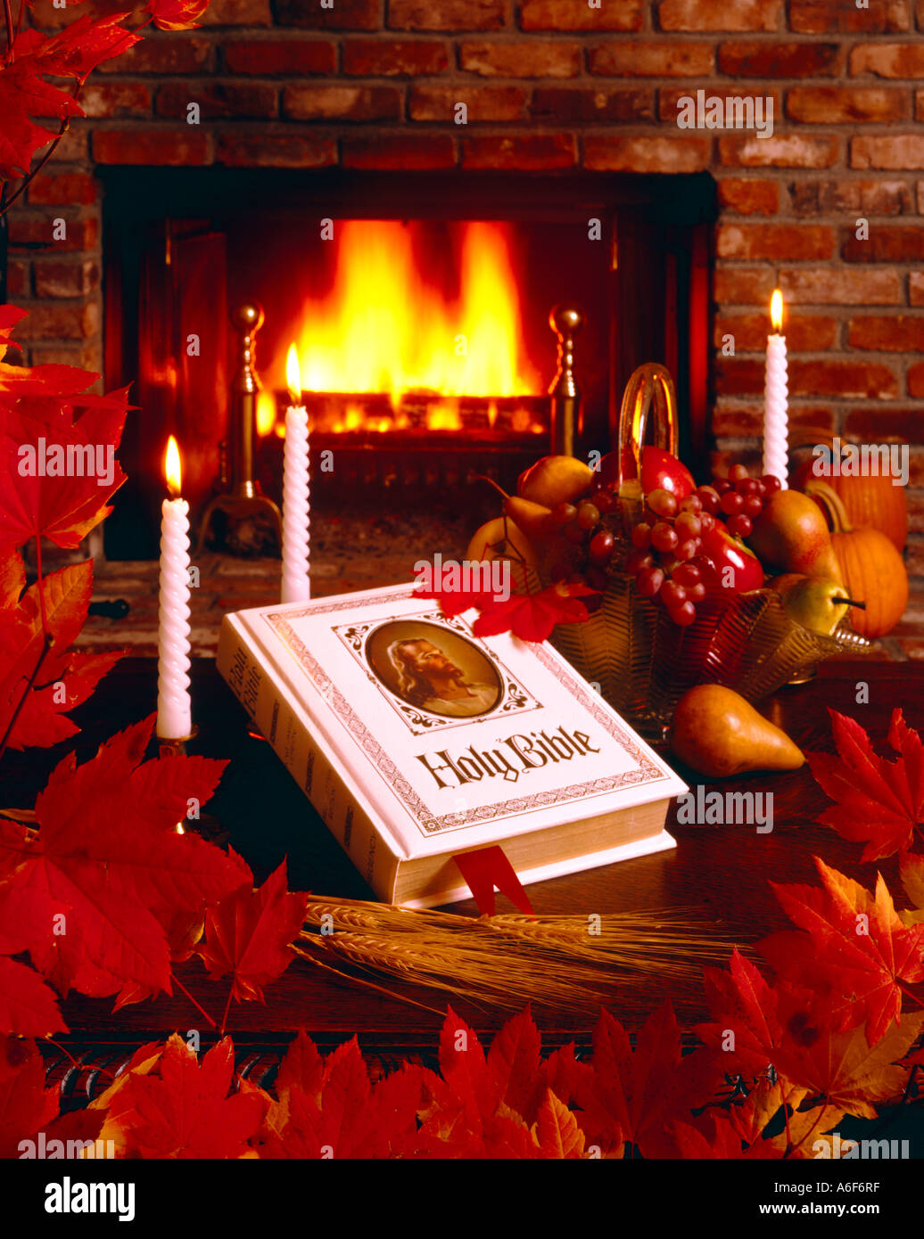 Autumnal religious still life featuring a Holy Bible in front of a ...