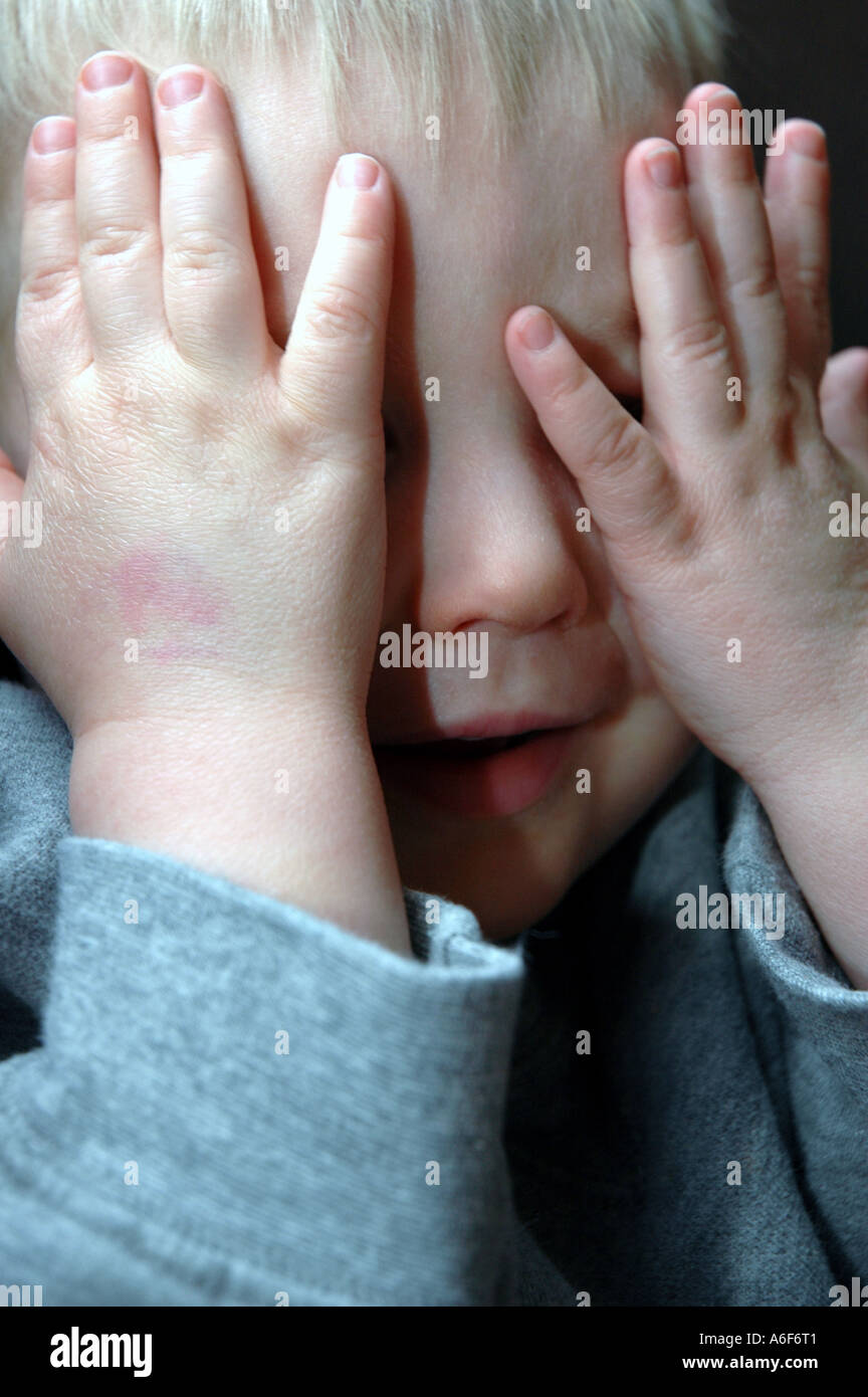peek a boo boy Stock Photo - Alamy