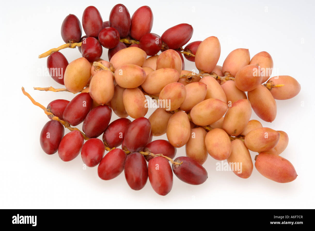 Fruit three red and pink dates bunch with white background Stock Photo ...