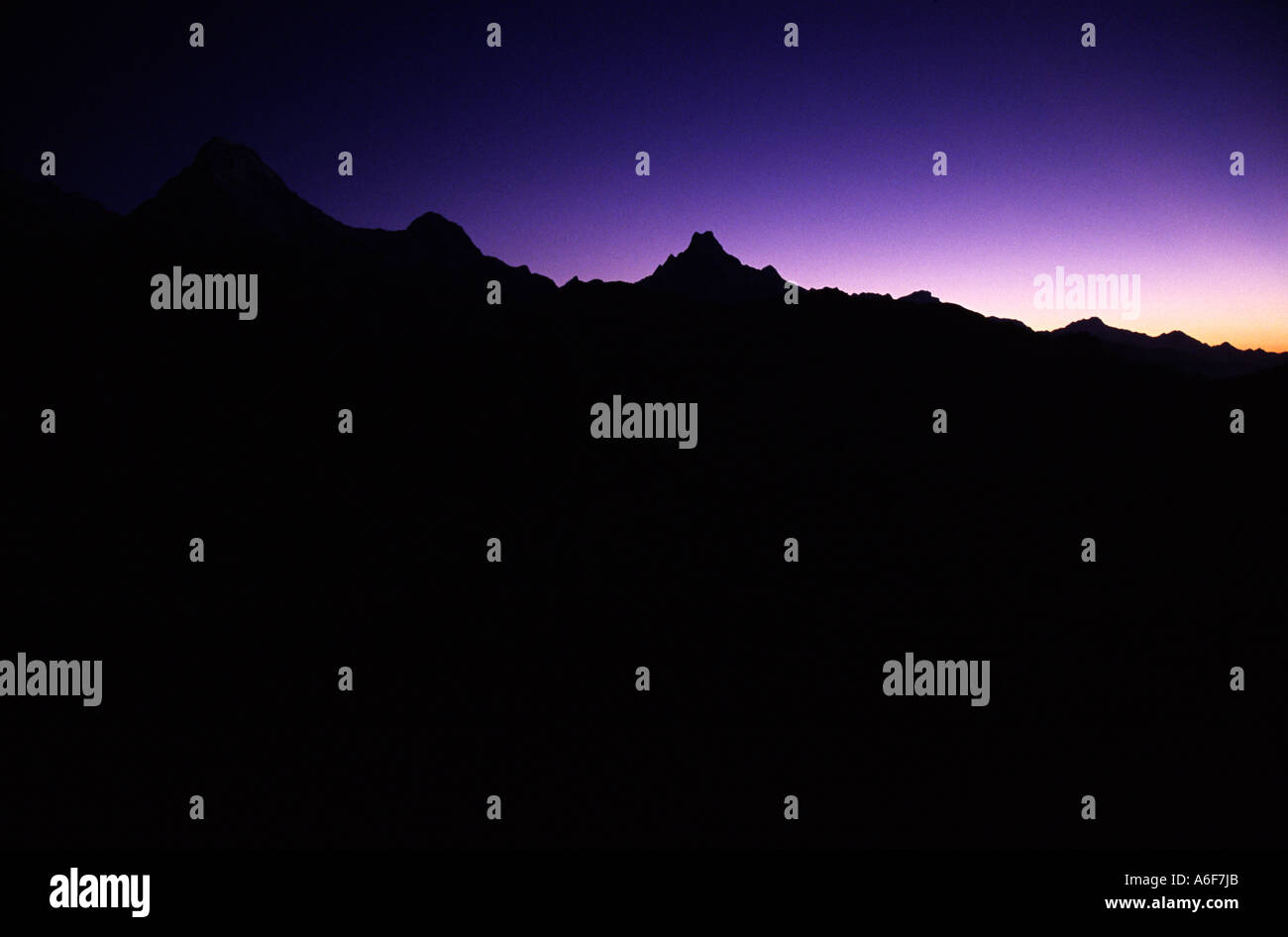 Pre sunrise silhouette of Machhapuchhare as seen from Poon Hill in the ...