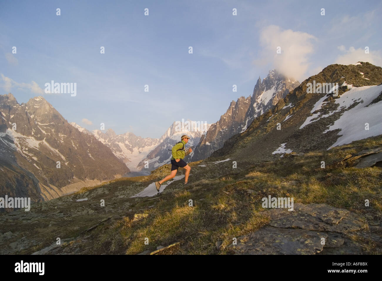 A man running in the French Alps near Chamonix France Stock Photo - Alamy