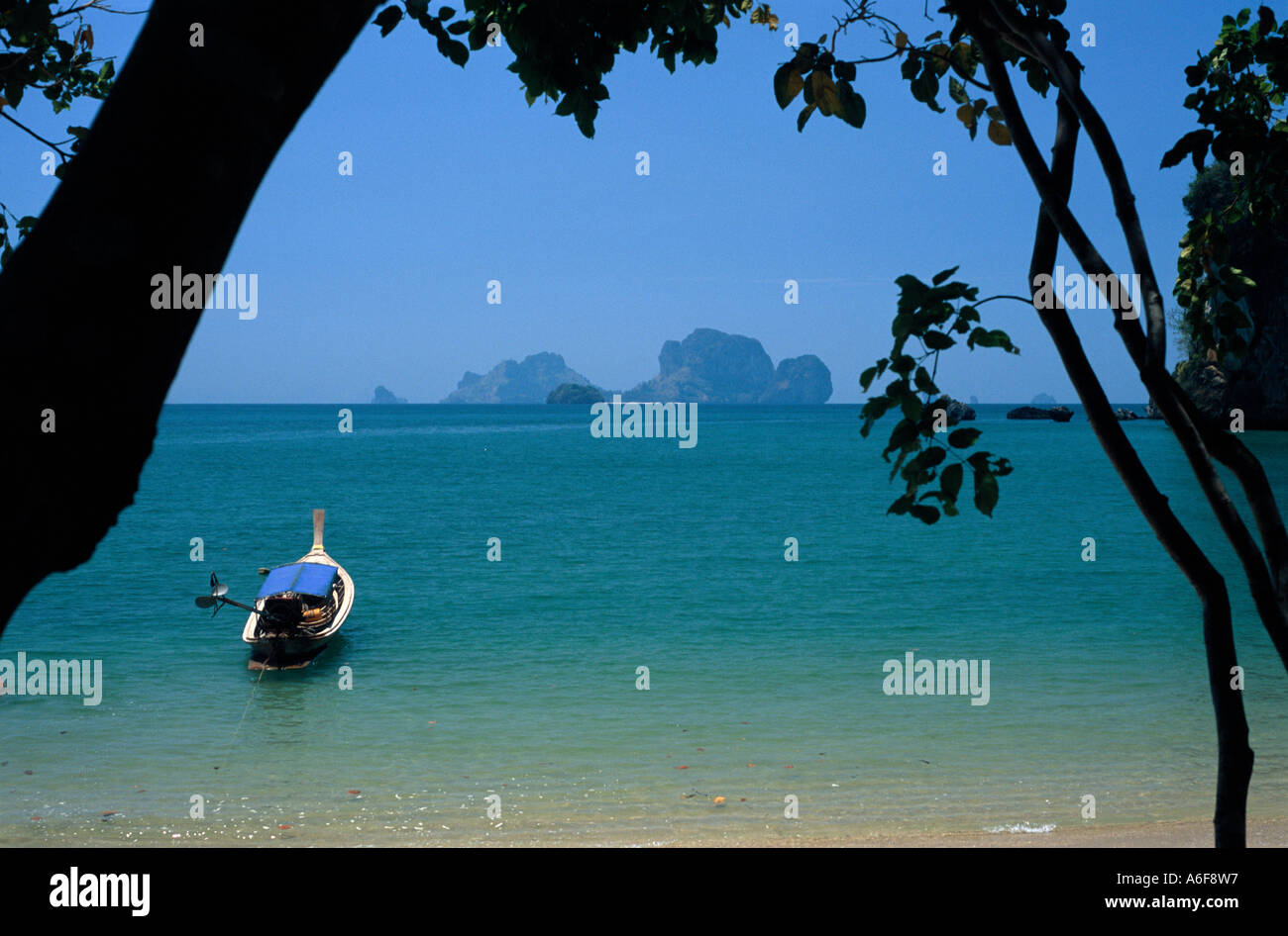 Tonsai Beach karst towers longtail boat azure water blue sky, Krabi ...