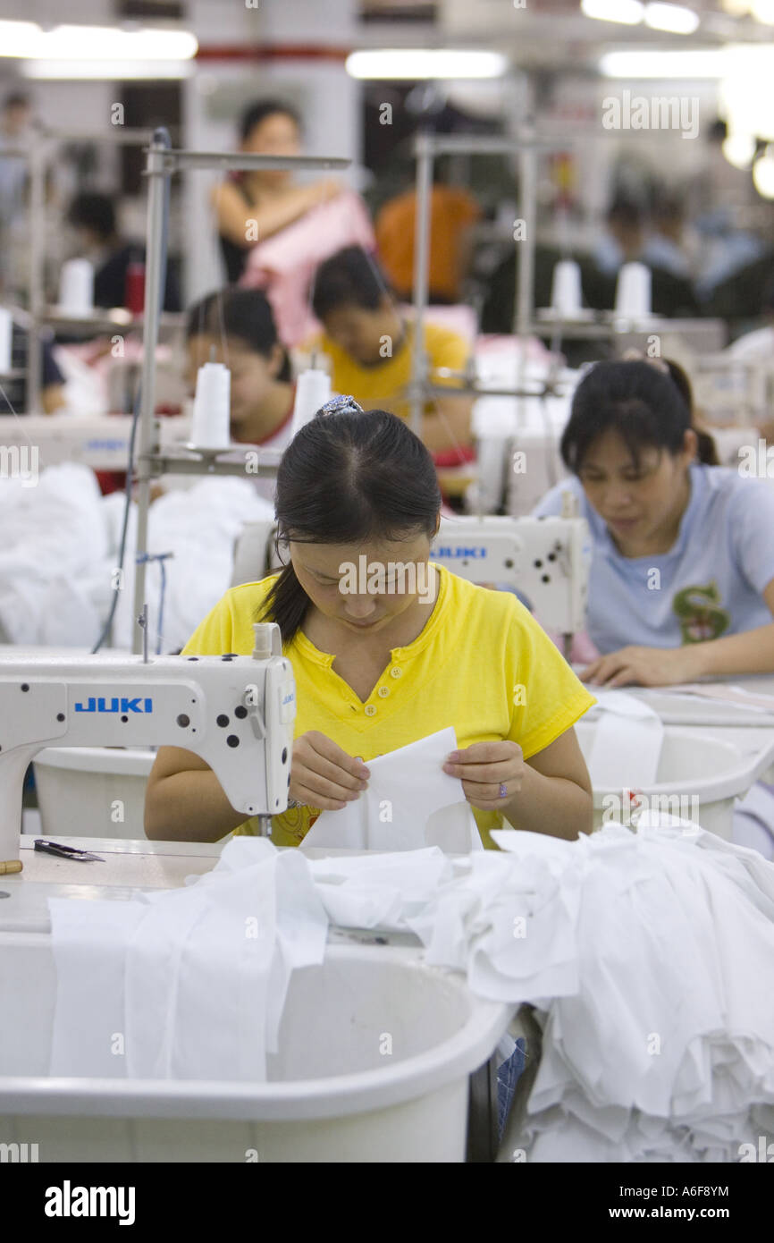 SHENZHEN GUANGDONG PROVINCE CHINA Women workers in a garment factory in ...