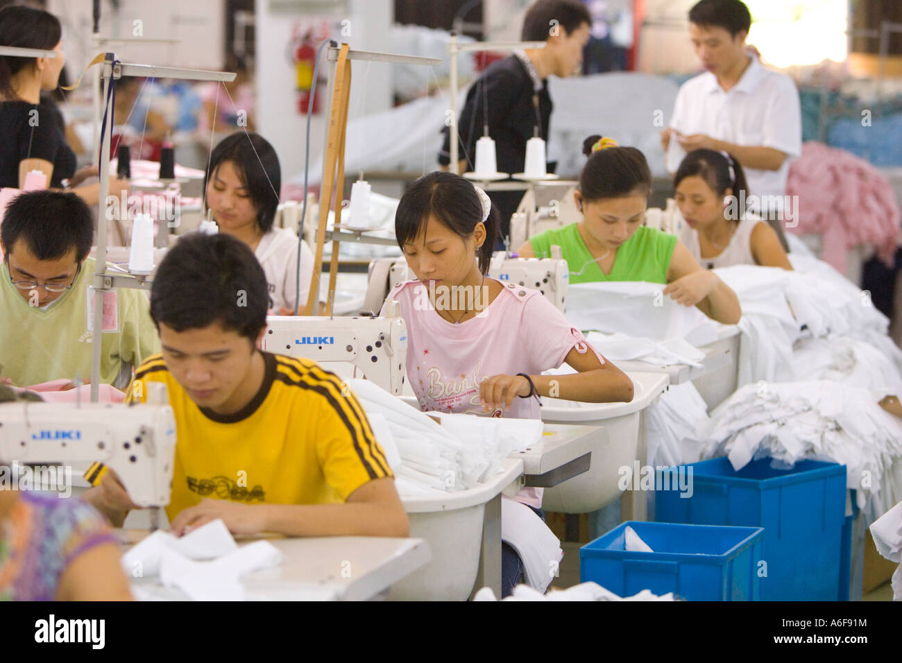 Globalization china workers hi-res stock photography and images - Alamy