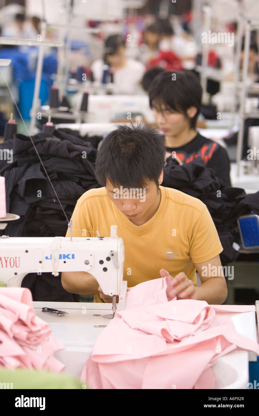 Globalization china workers hi-res stock photography and images - Alamy