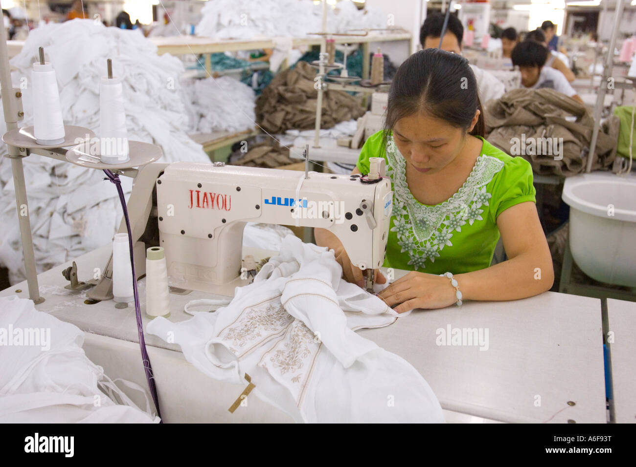 Sweatshop china hi-res stock photography and images - Alamy
