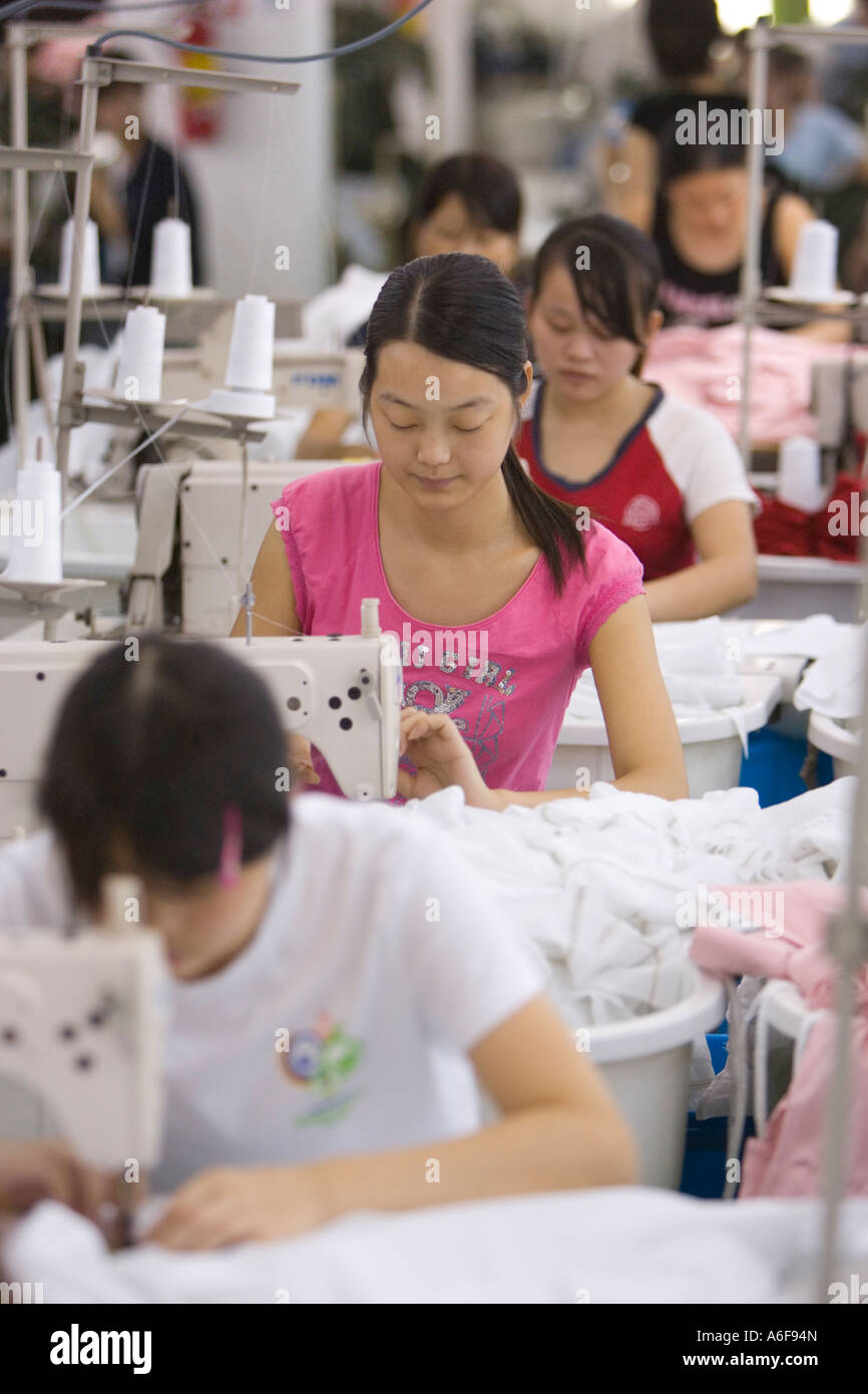 SHENZHEN GUANGDONG PROVINCE CHINA Workers in a garment factory in city ...