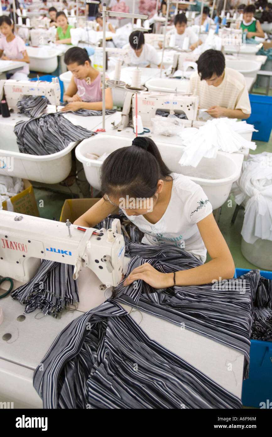 Globalization china workers hi-res stock photography and images - Alamy