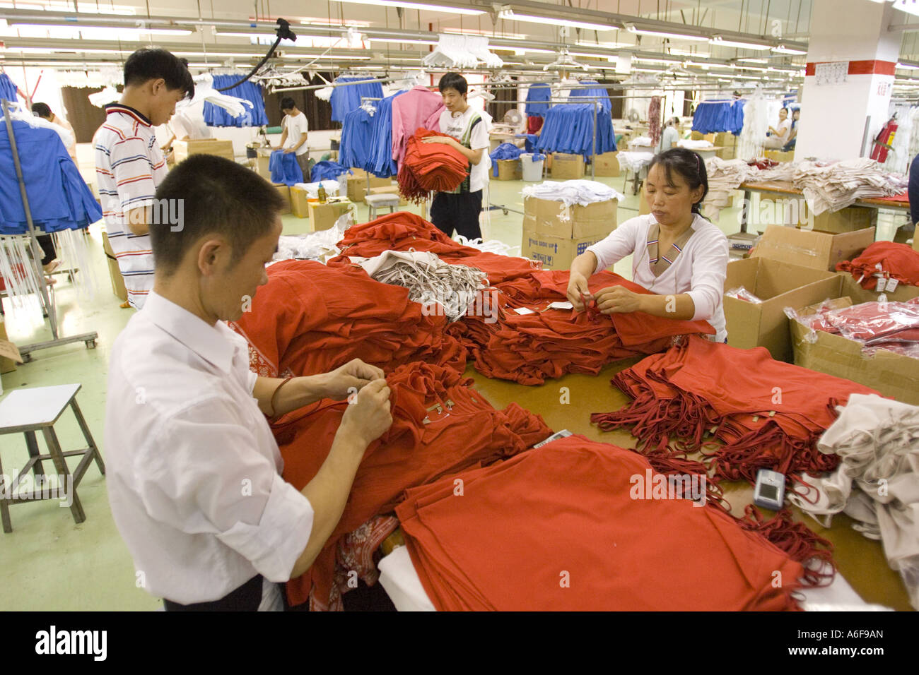 Globalization china workers hi-res stock photography and images - Alamy