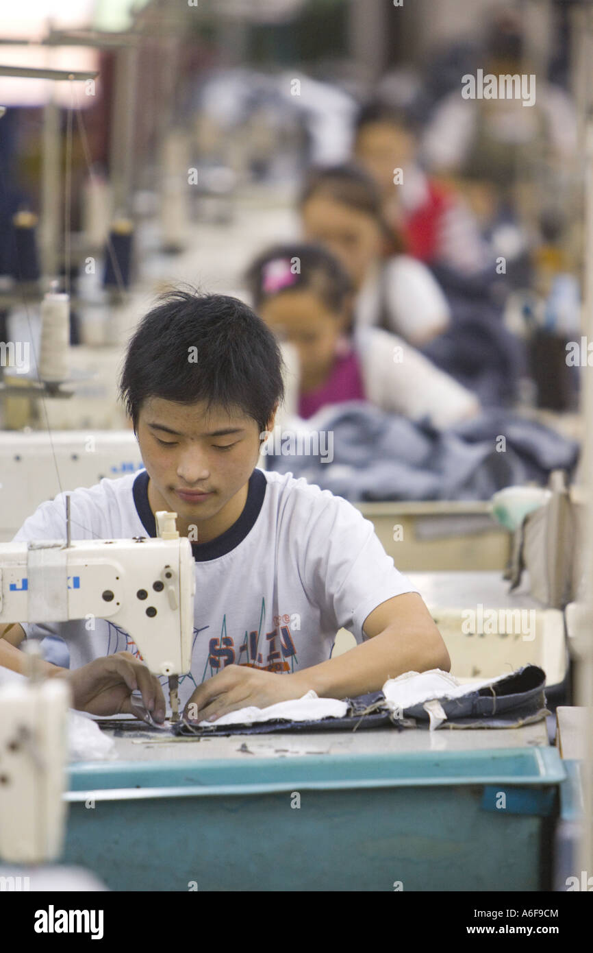 Asian garment workers sewing hi-res stock photography and images - Alamy