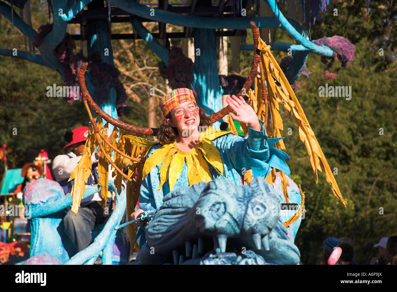 Girl driving colourful float, Mickey’s Jammin Jungle Parade, Animal ...