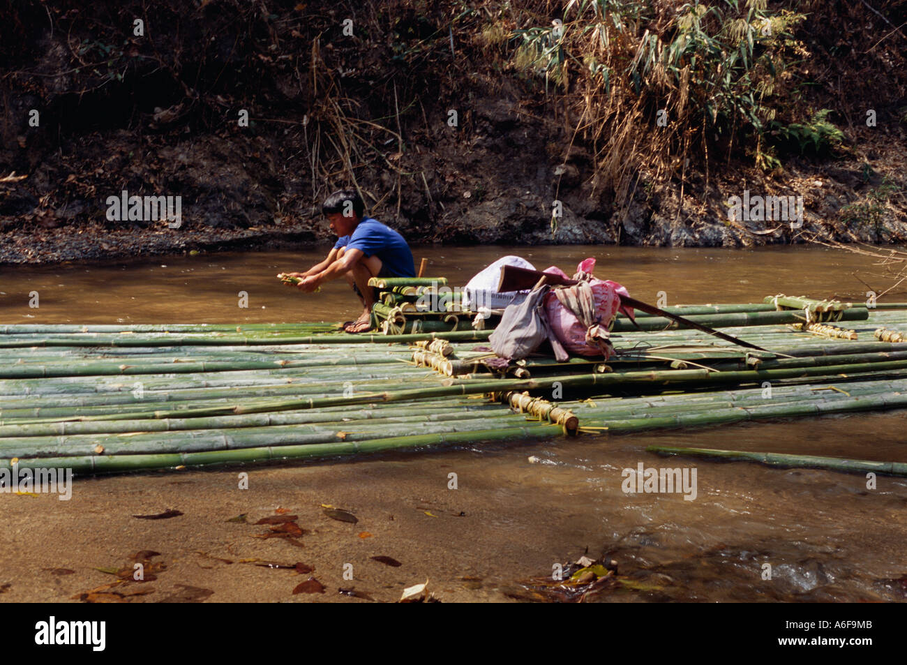 Shan trekking guide with handmade flintlock rifle and handmade bamboo ...