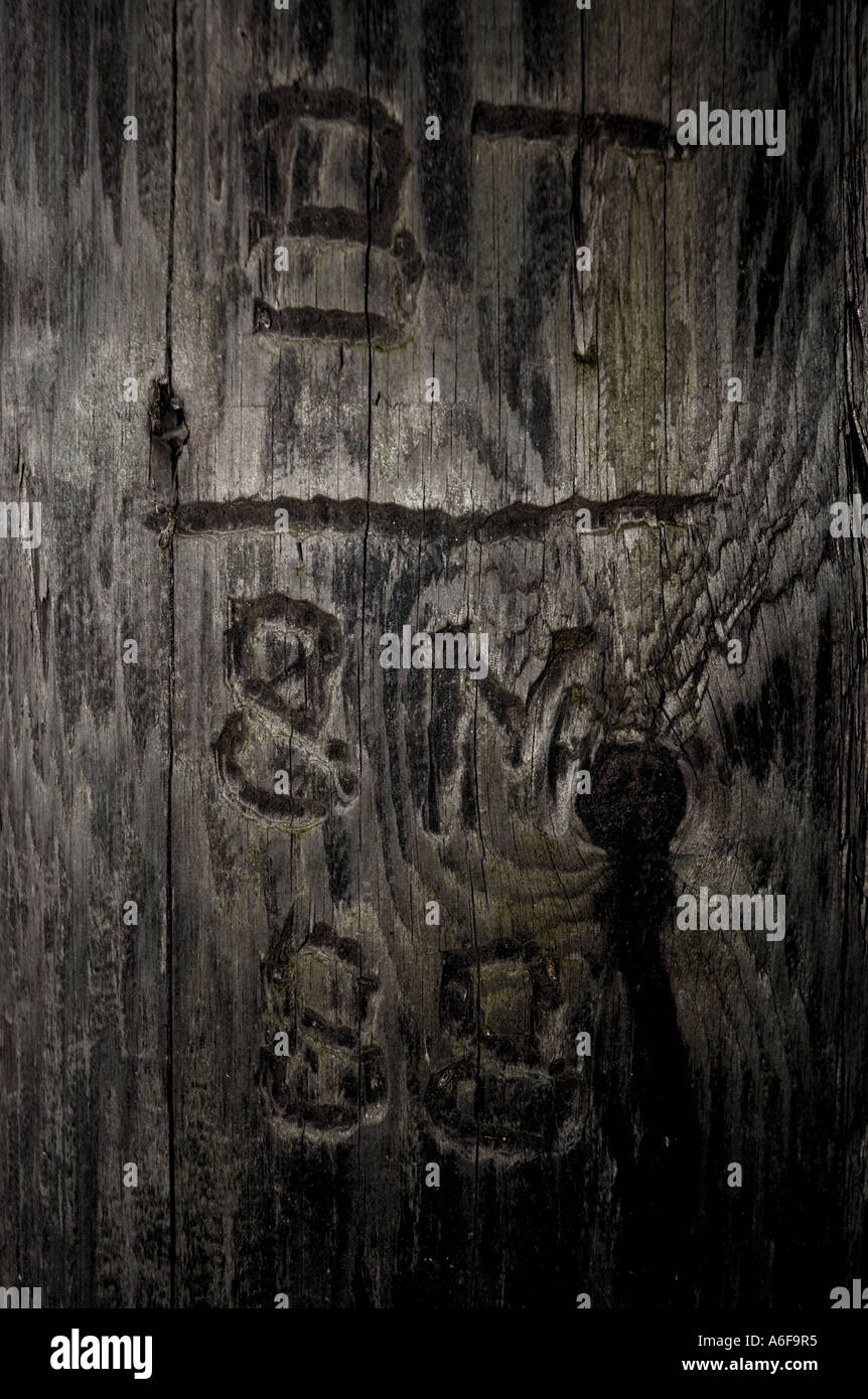 wood pole telegraph pole, carving, wood Stock Photo - Alamy