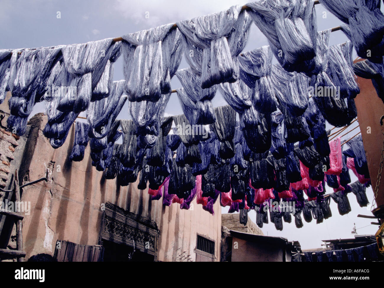 Drying dyed fabric Marrakesh Morocco Stock Photo - Alamy