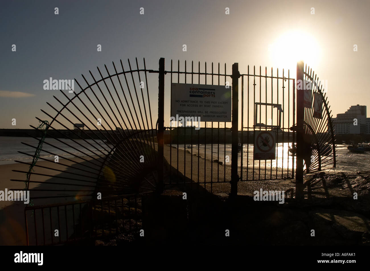 slhouette, bars, no entry, spikes, admittance, closed, sunset Stock ...