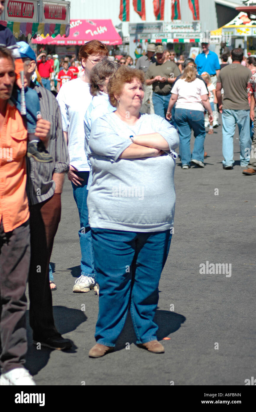 Very large heavy people at Fair Stock Photo - Alamy