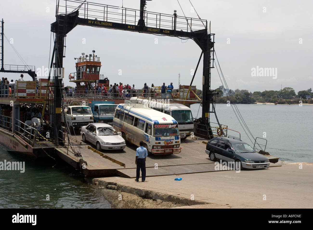 Vehicles driving off ferry at Likoni Mombasa Kenya East Africa Stock ...