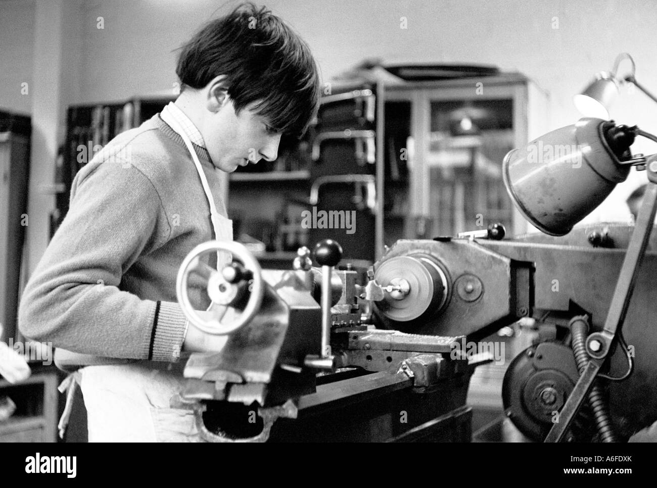 Boy pupil learning to use a lathe at school. London 1966 Stock Photo ...