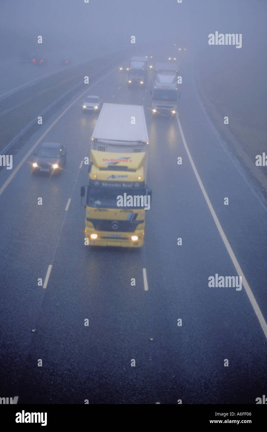 Vehicles in thick fog on the A1M motorway, Yorkshire, England, UK Stock ...