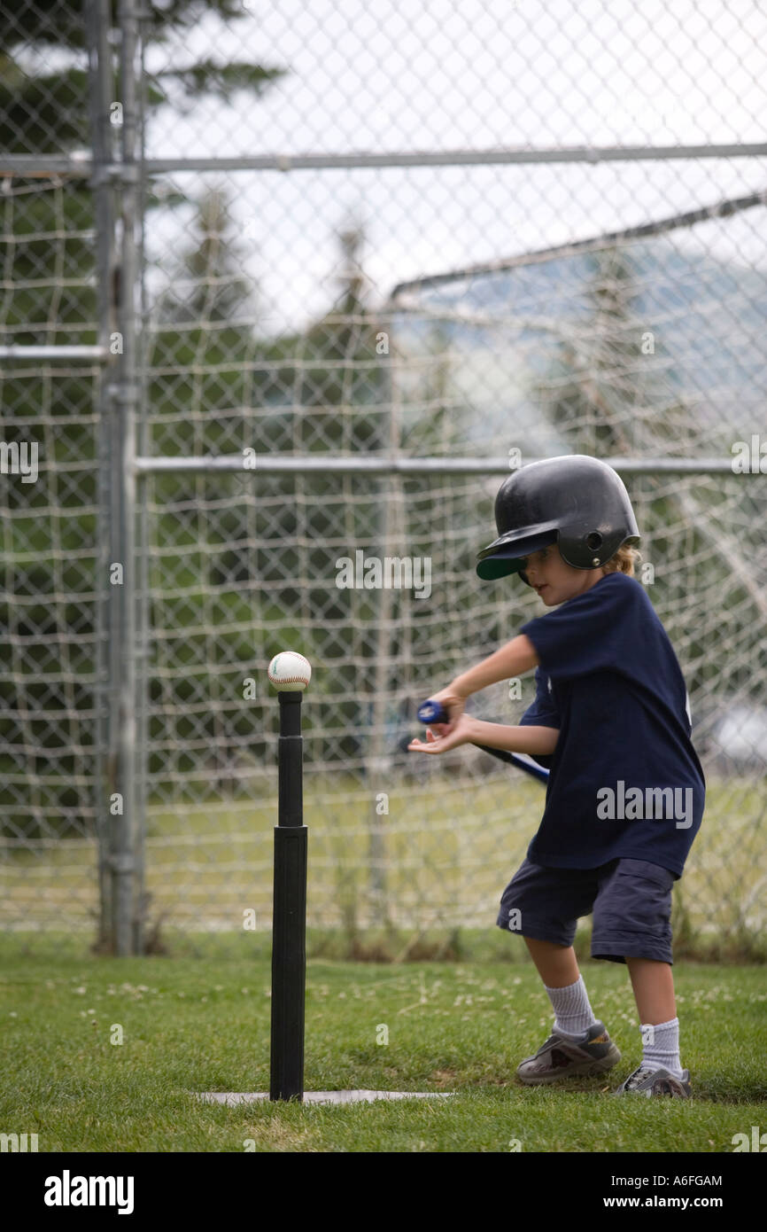 Young boy practicing T Ball Stock Photo - Alamy