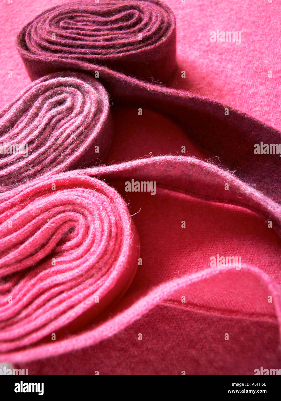 pink scarves on pink background Stock Photo - Alamy