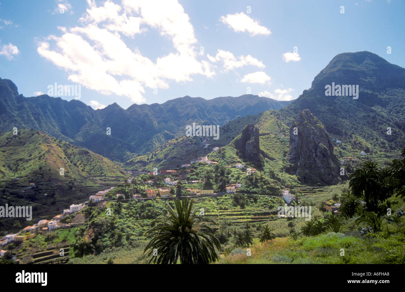 Landscape view of Hermigua valley and village showing houses and terraces La Gomera Canary ...
