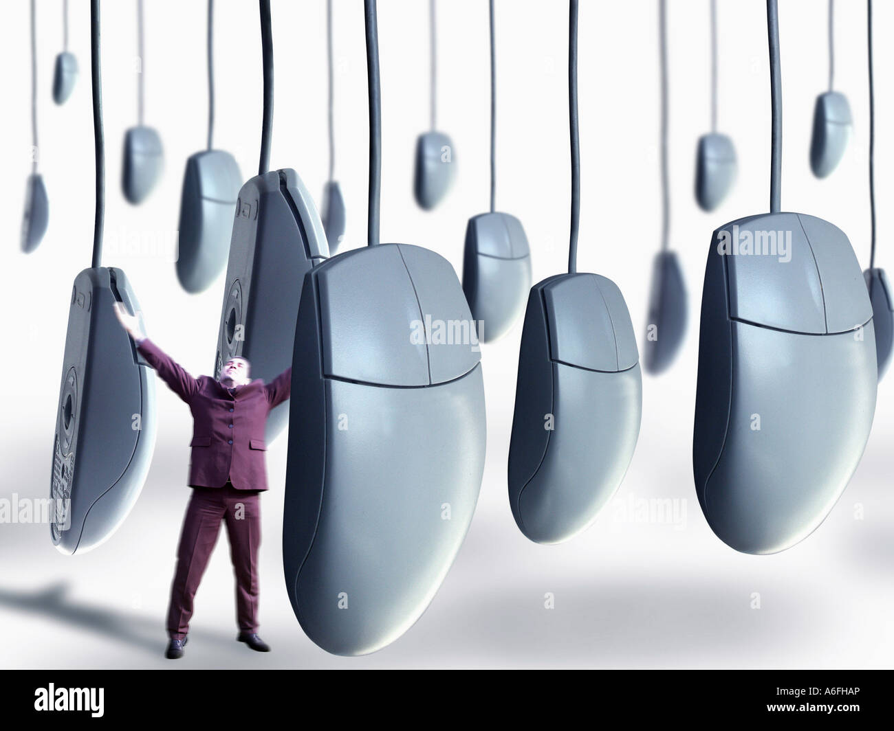 Digital concept of a man amongst computer mice Stock Photo - Alamy