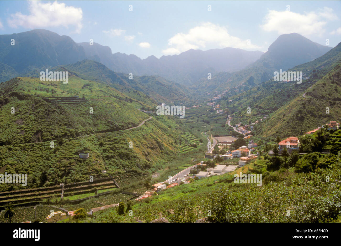 Landscape view of Hermigua valley and village showing houses and terraces La Gomera Canary ...