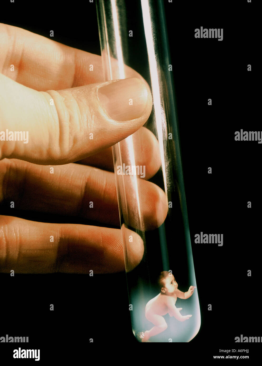 Baby in test tube Stock Photo - Alamy